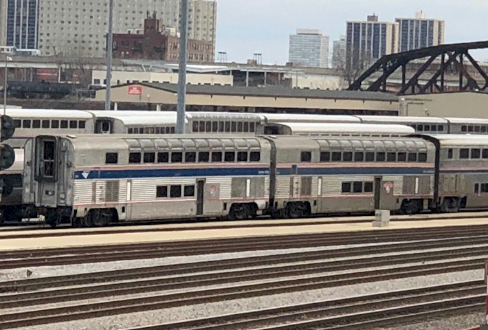 Two Pacific Parlour cars are photographed in the Amtrak Chicago Yard ...